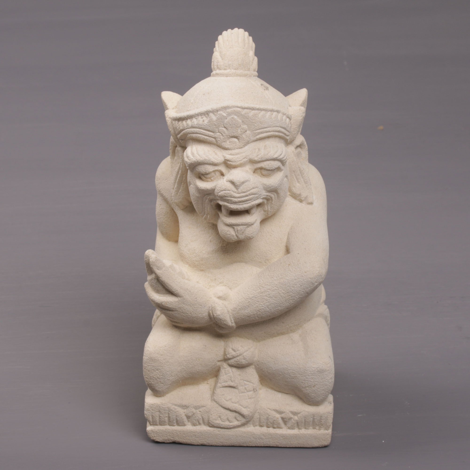 Hand-Carved Sandstone Sculpture of Merdah from Bali - Merdah | NOVICA